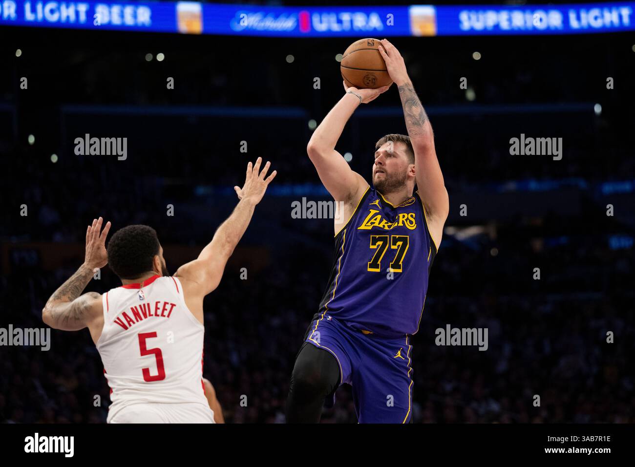 Los Angeles Lakers guard Luka Doncic (77) shoots ver Houston Rockets ...