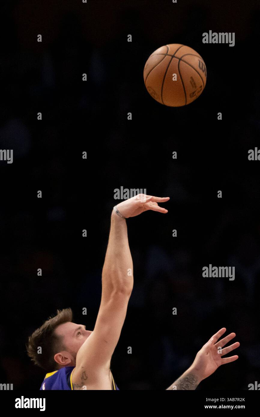 Los Angeles Lakers guard Luka Doncic (77) shoots during the first half ...