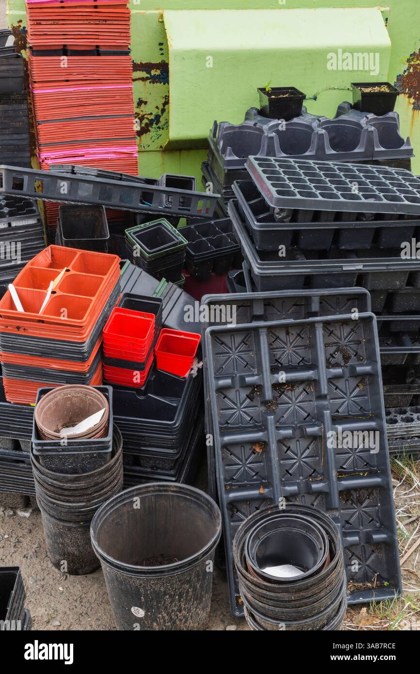 Assorted plastic trays and containers for starting seedlings, Quebec ...