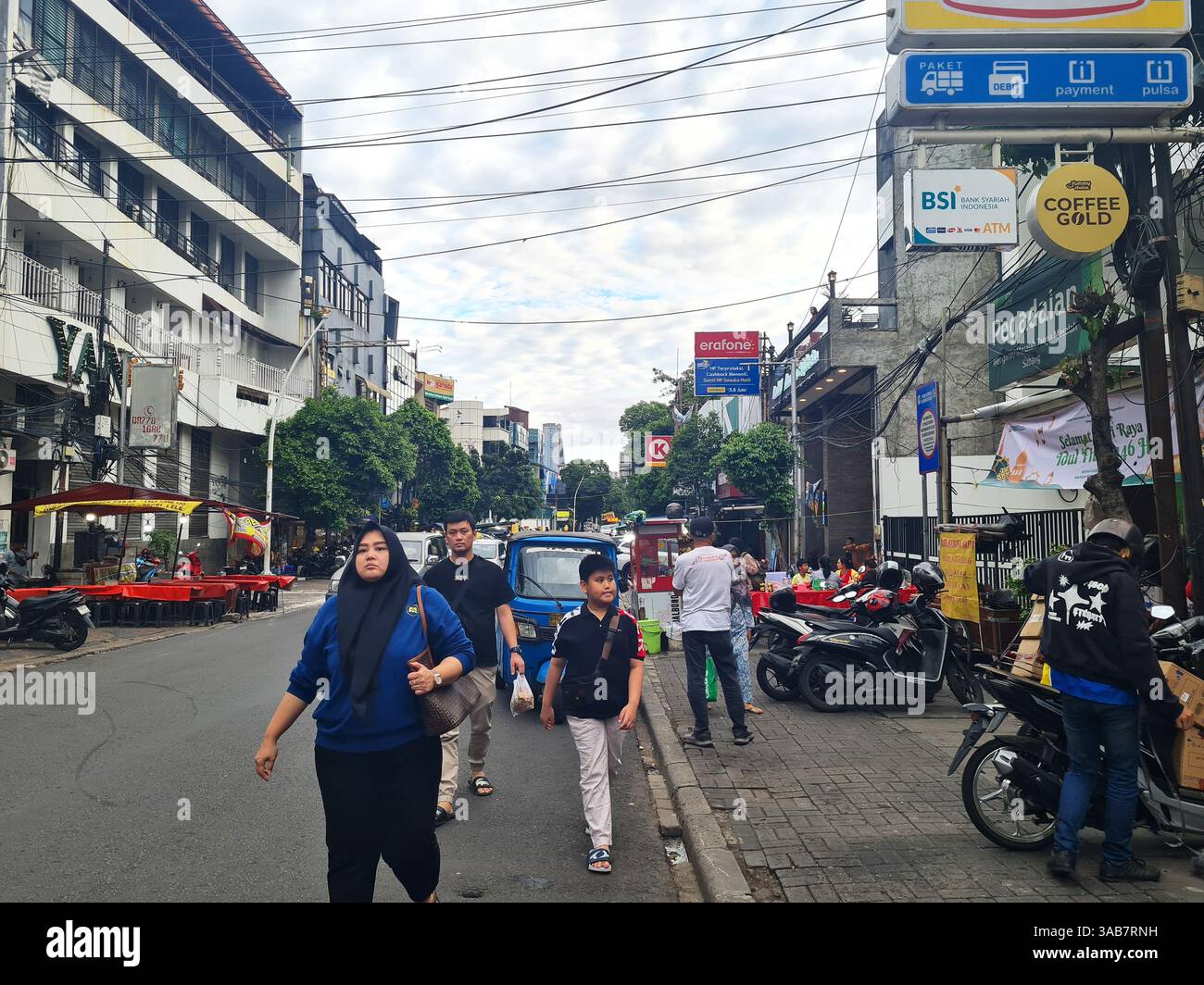 Bajaj or tuk-tuk inexpensive three-wheeler transportation in Jakarta ...