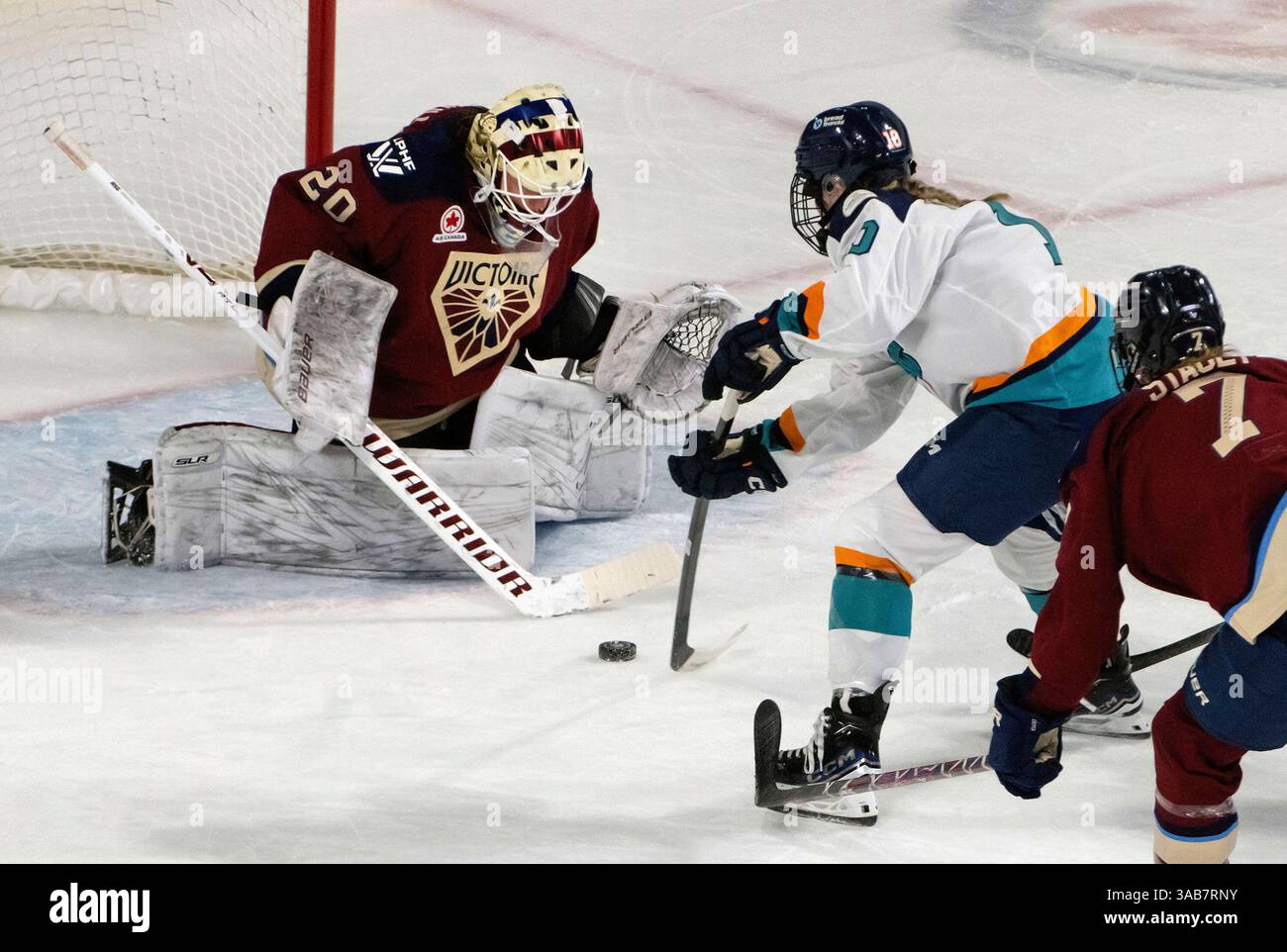 New York Sirens' Sarah Fillier (10) takes the puck to Montreal Victoire ...