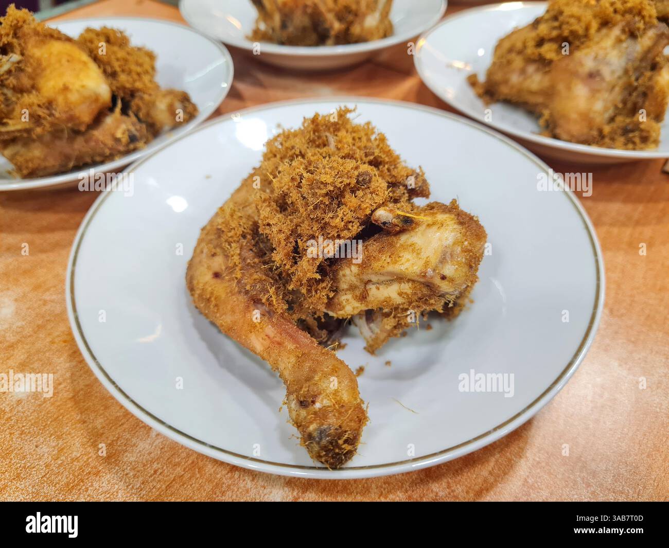 Indonesian fried chicken West Sumatra style at a Padang restaurant in ...