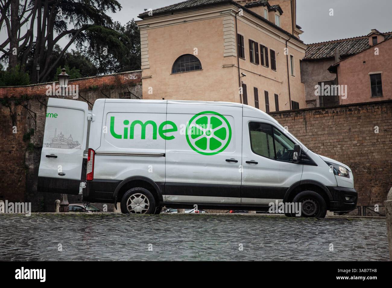 ROME, ITALY - JANUARY 15, 2025: Van with Lime Micromobility logo in ...