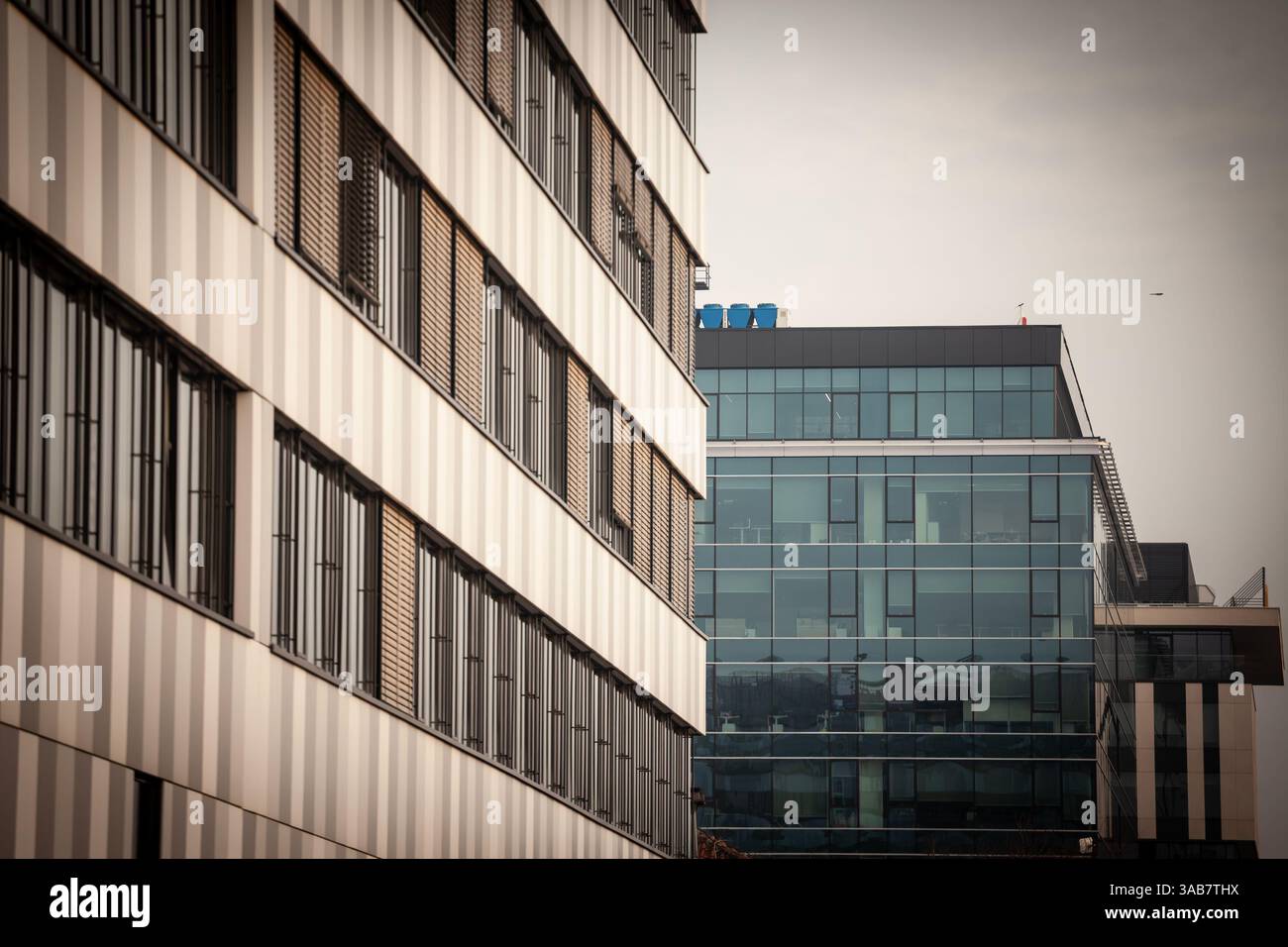 Modern office buildings featuring glass facades, part of a contemporary ...