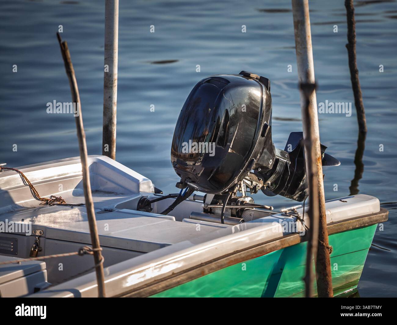 Close-up of an outboard boat motor, emphasizing marine propulsion ...