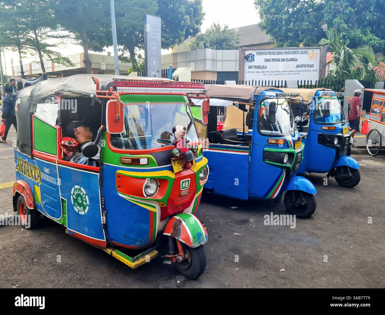 Bajaj or tuk-tuk inexpensive three-wheeler transportation in Jakarta ...