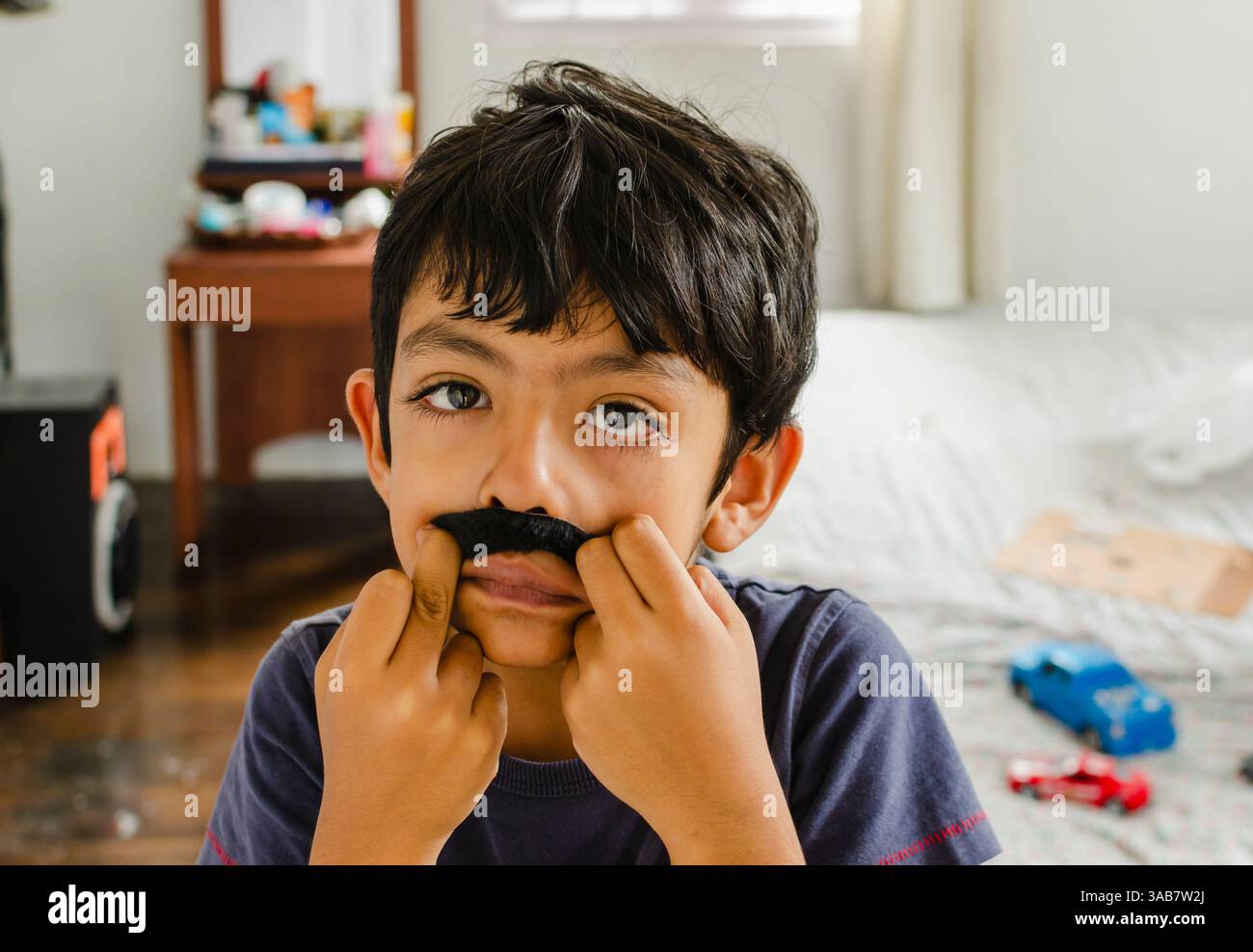 An East Indian boy / Asian Indian boy / Indian boy / child / kid ...