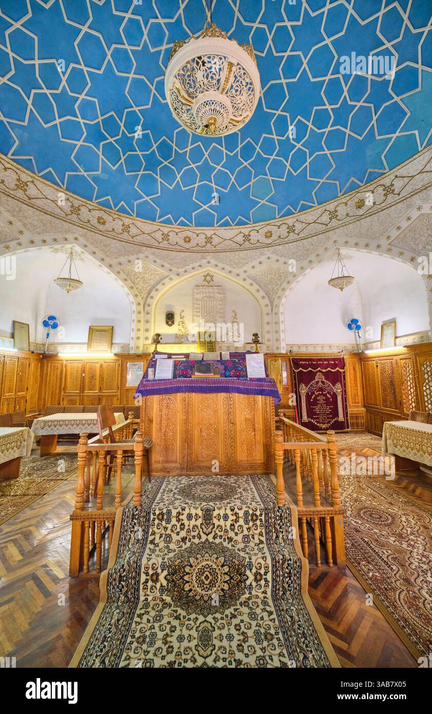 Intricate woodwork and a large, blue dome in the main synagogue. At the ...