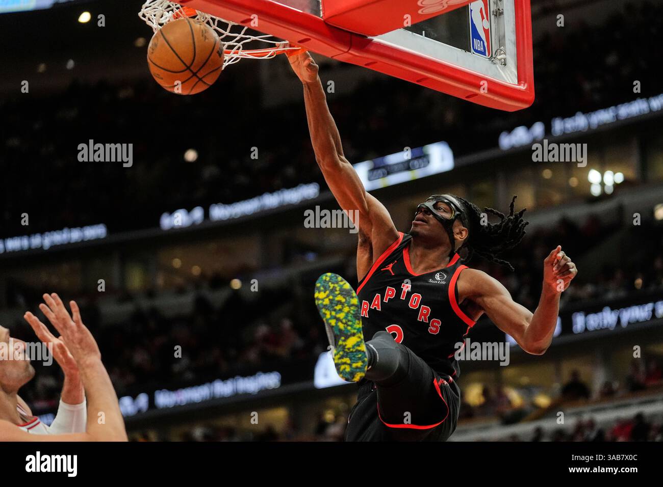 Toronto Raptors forward Jonathan Mogbo (2) dunks the ball during the ...