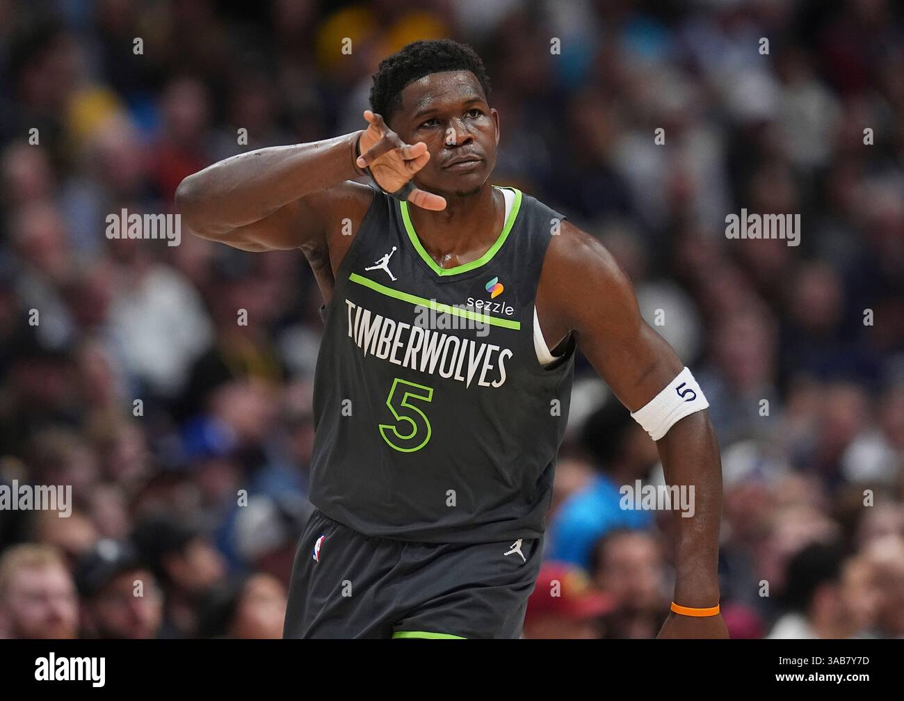 Minnesota Timberwolves guard Anthony Edwards gestures to the bench ...