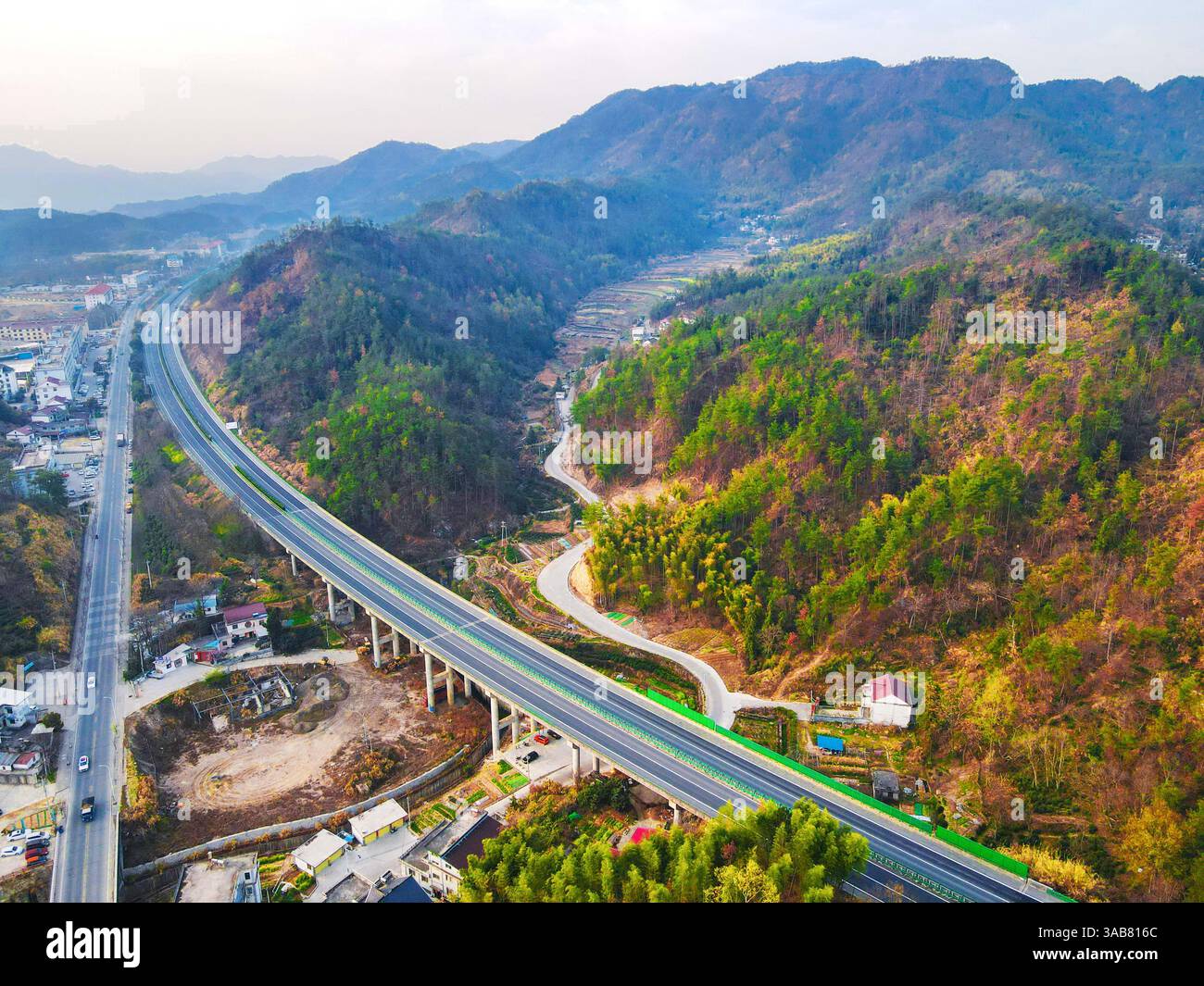 ANQING, CHINA - APRIL 2, 2025 - The Lu'an Qianshan Expressway passes ...