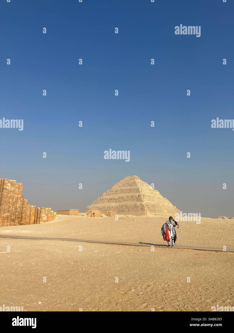Step Pyramid of Djoser with an Egyptian sales man selling scarves at ...