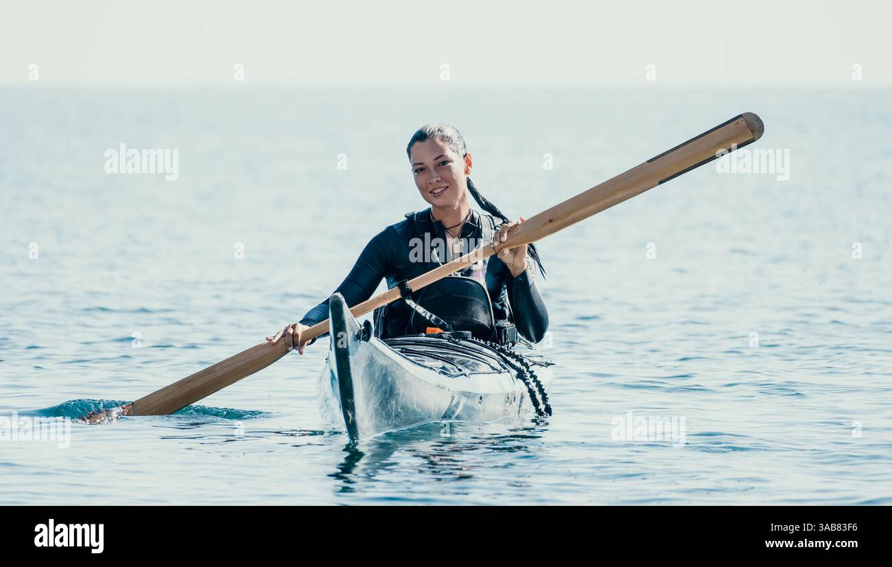 Kayaking, Woman, Ocean: Paddling Solo in Sea Kayak During Daytime Stock ...