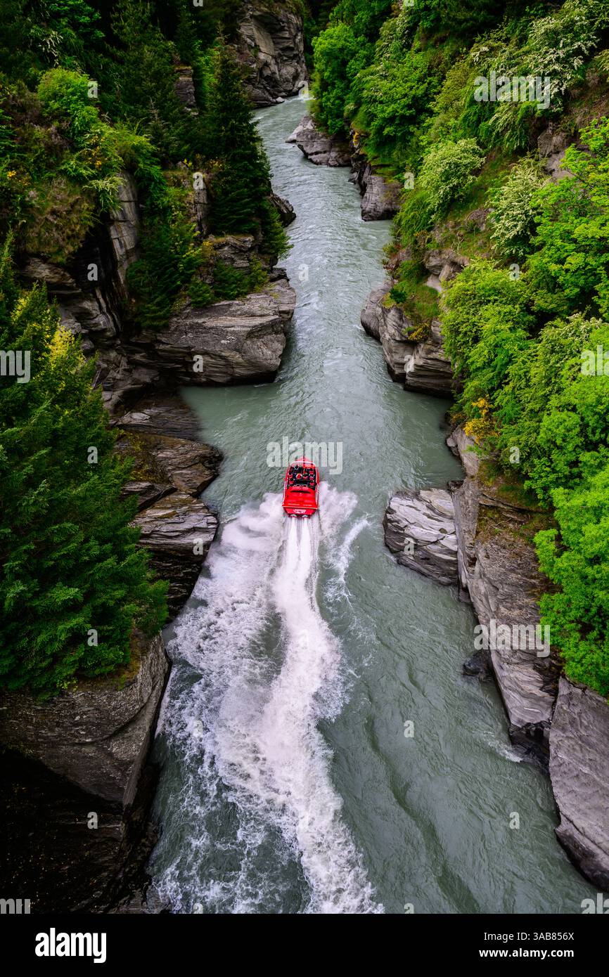 The Shotover River in New Zealand with Jet boats jetting by Stock Photo ...