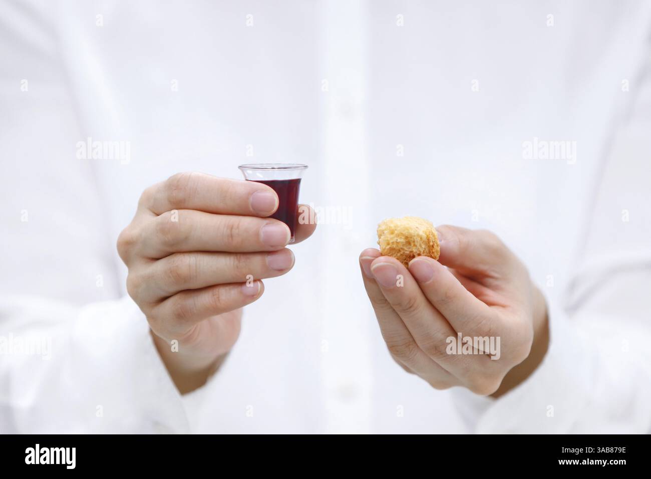 Holy Communion, Christians praying with bread and wine symbolizing the ...