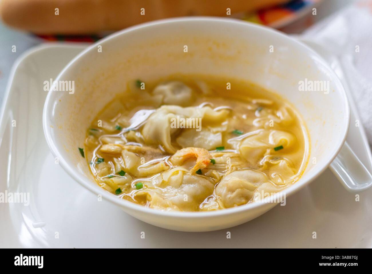 A bowl of Pancit Molo, a traditional and well-loved dumpling noodle ...
