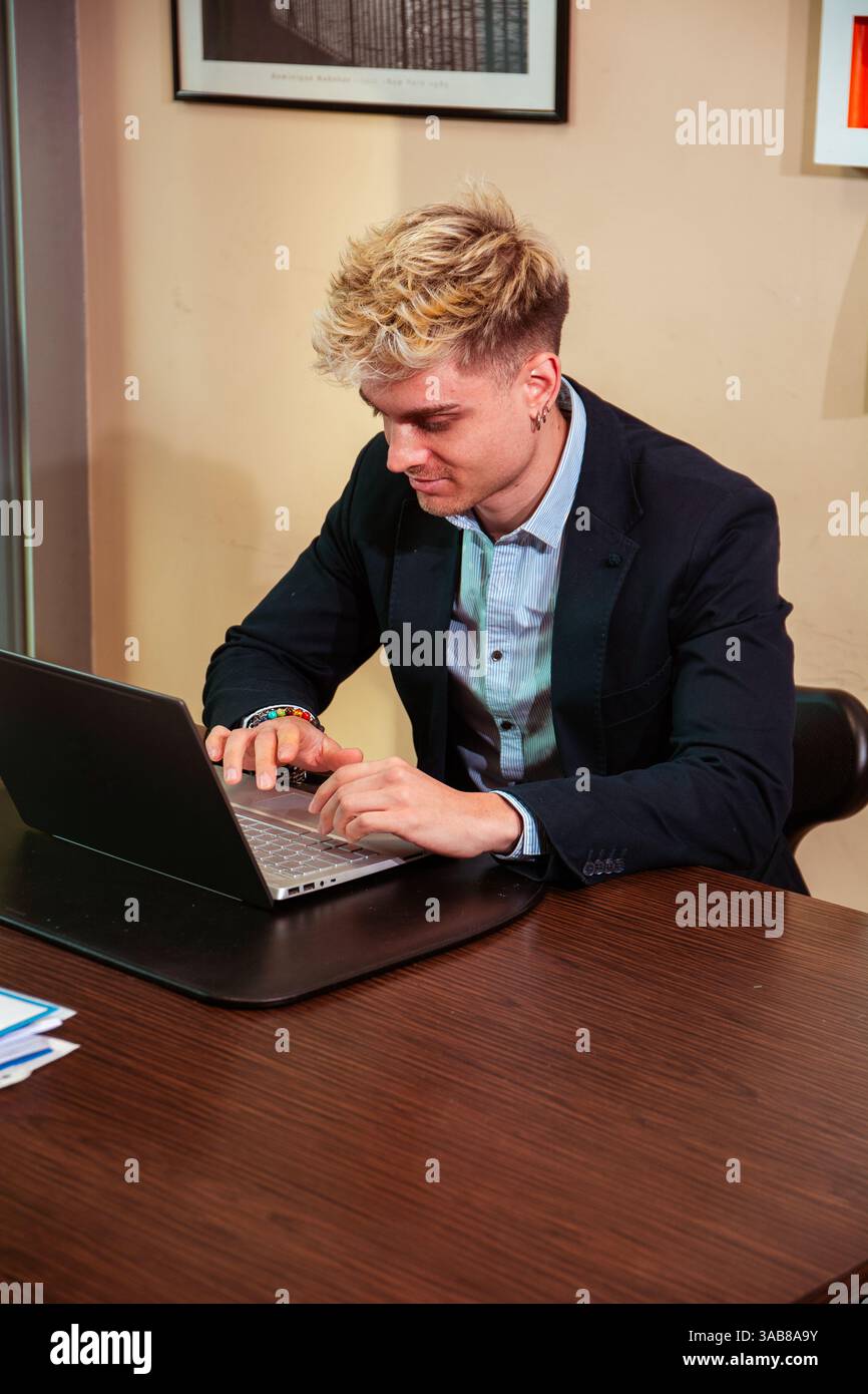 Handsome focused man sits hi-res stock photography and images - Alamy