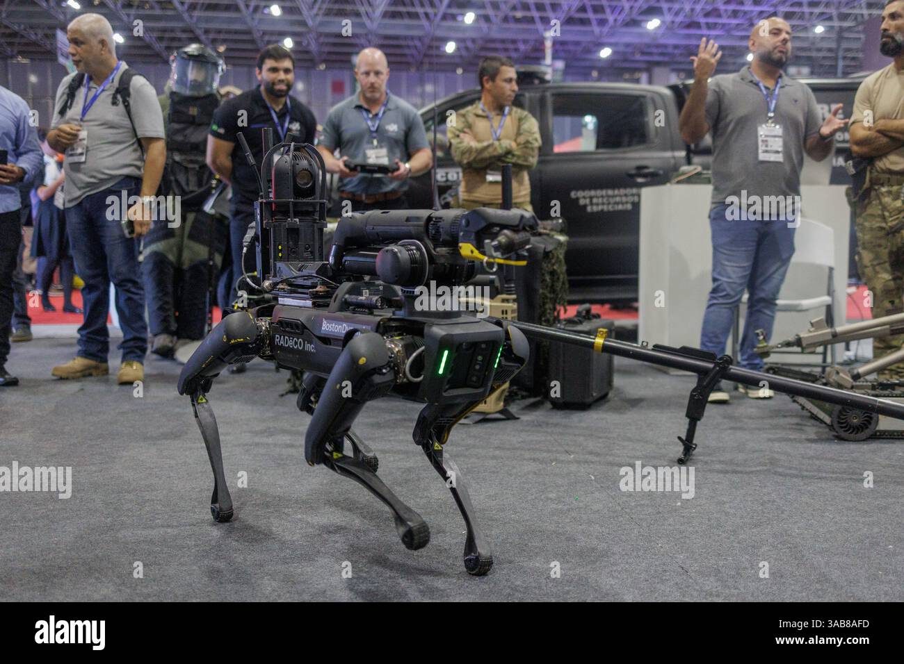 Rio De Janeiro, Brazil. 1st Apr, 2025. Visitors look at defense and ...