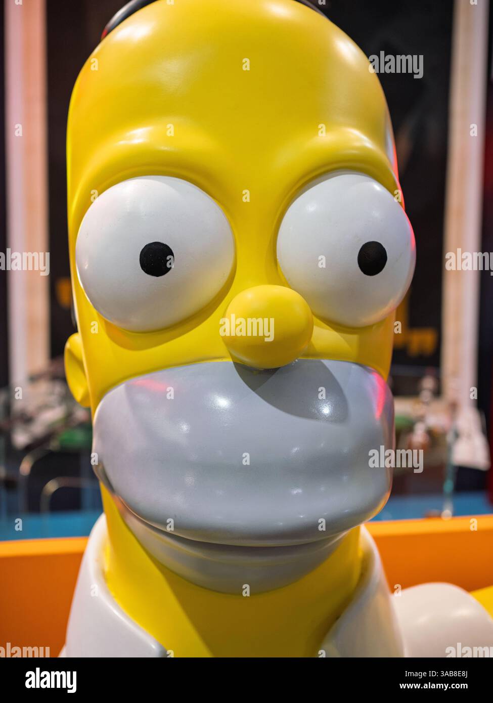 Yellow Homer Simpson close-up Statue with big Eyes Stock Photo - Alamy