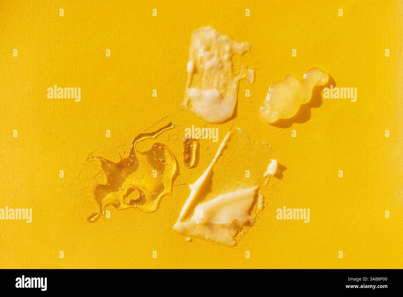 Different texture of gel and cream on a yellow background. Transparent ...