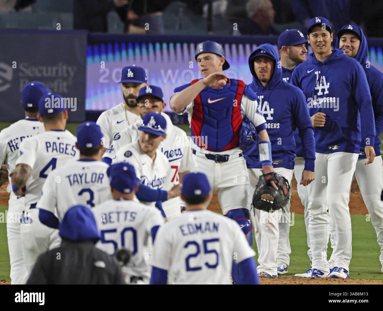 Los Angeles Dodgers players high-five each other after beating the ...