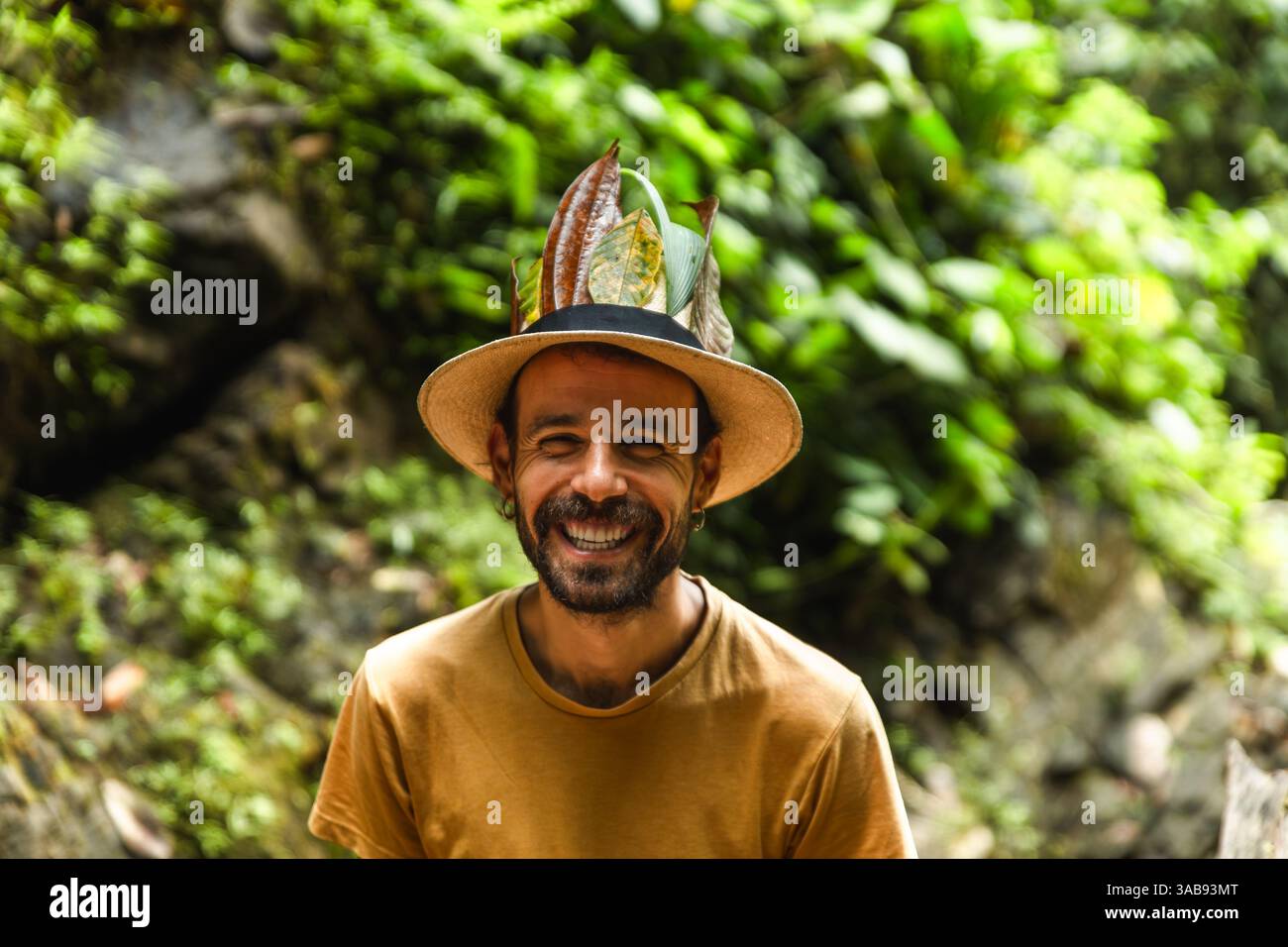 A cheerful Spanish young man beams joyfully in the Choco Andino ...