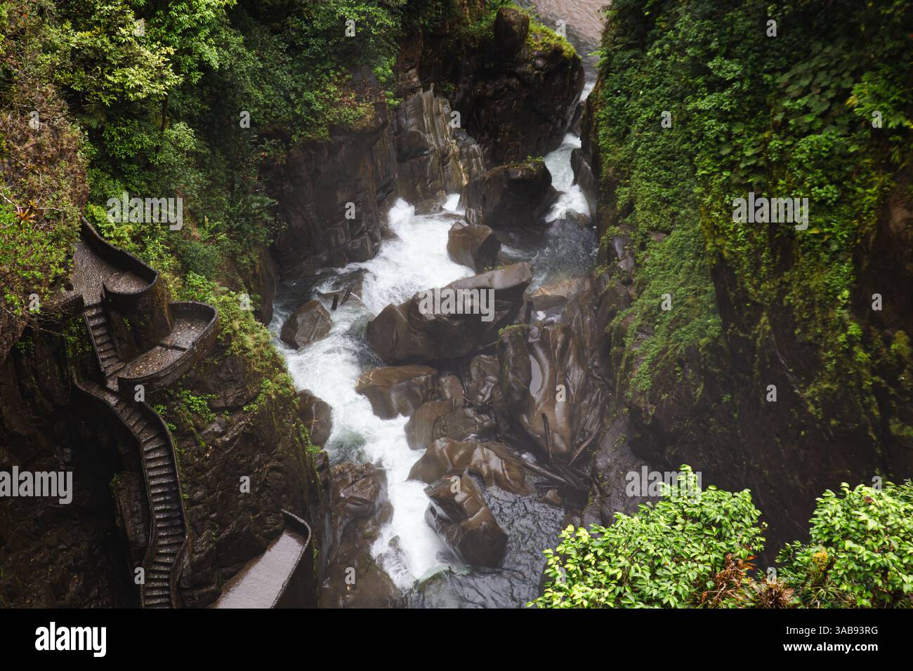 Spectacular view of a cascading waterfall surrounded by lush greenery ...