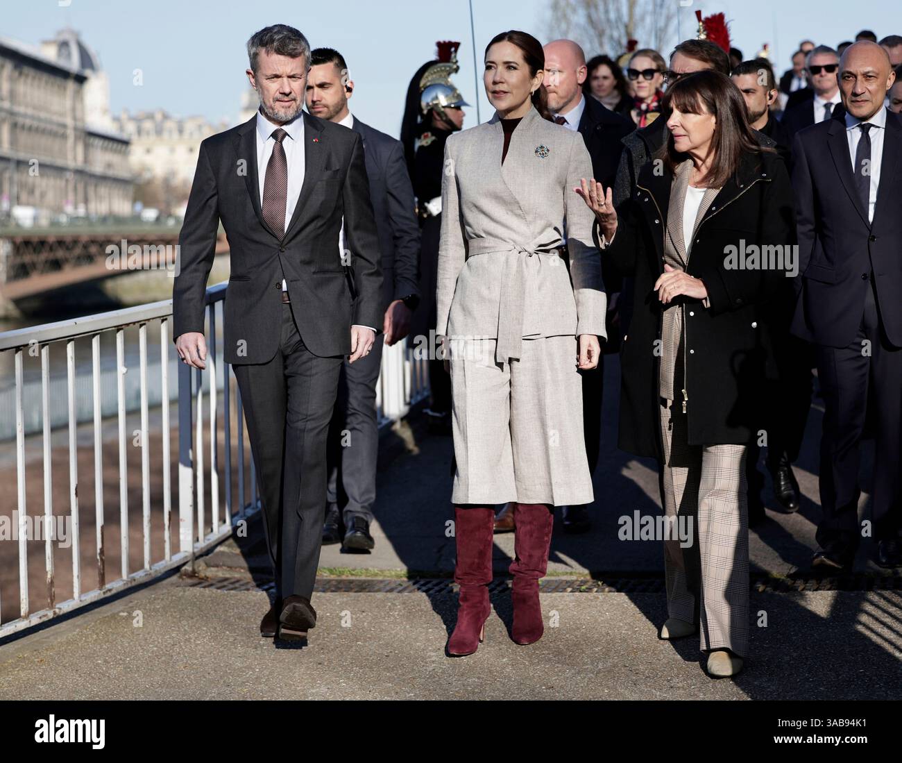 Paris mayor Anne Hidalgo, right, walks with King Frederik X and Queen ...