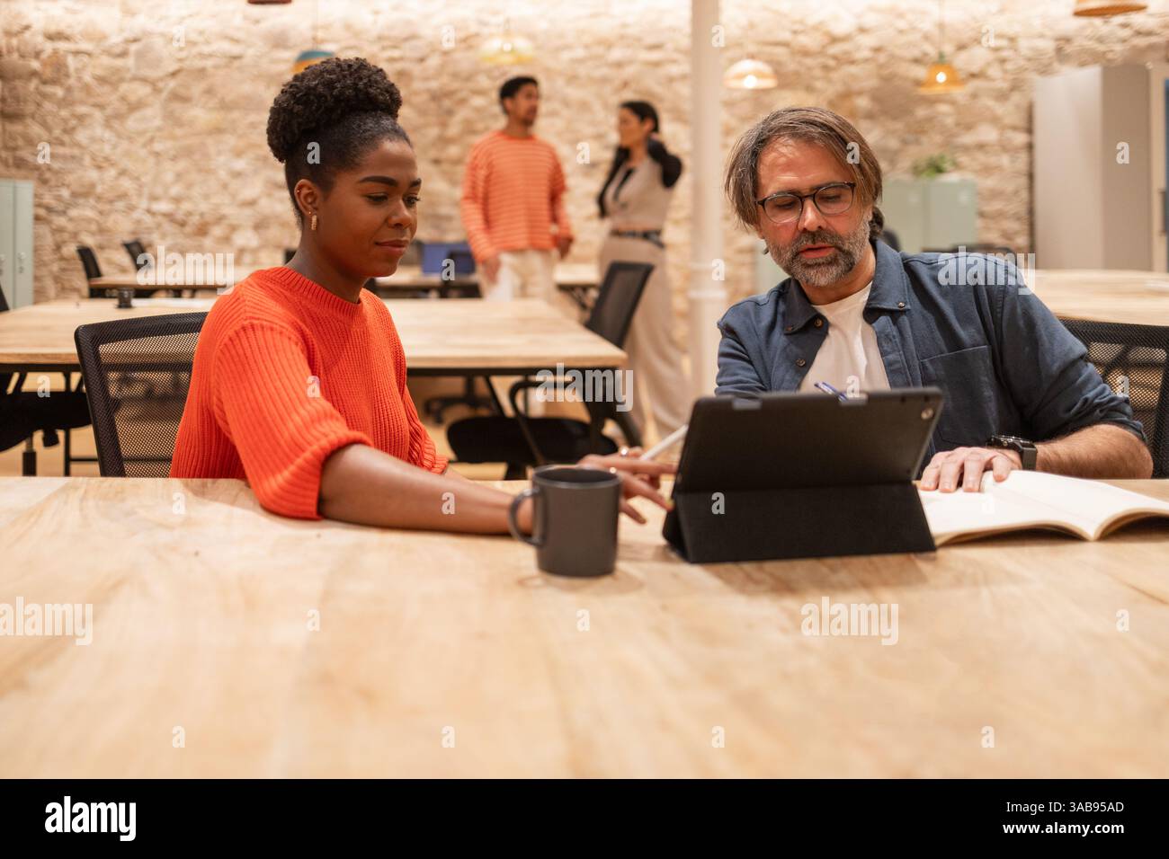 Group diverse professionals collaborates on hi-res stock photography ...