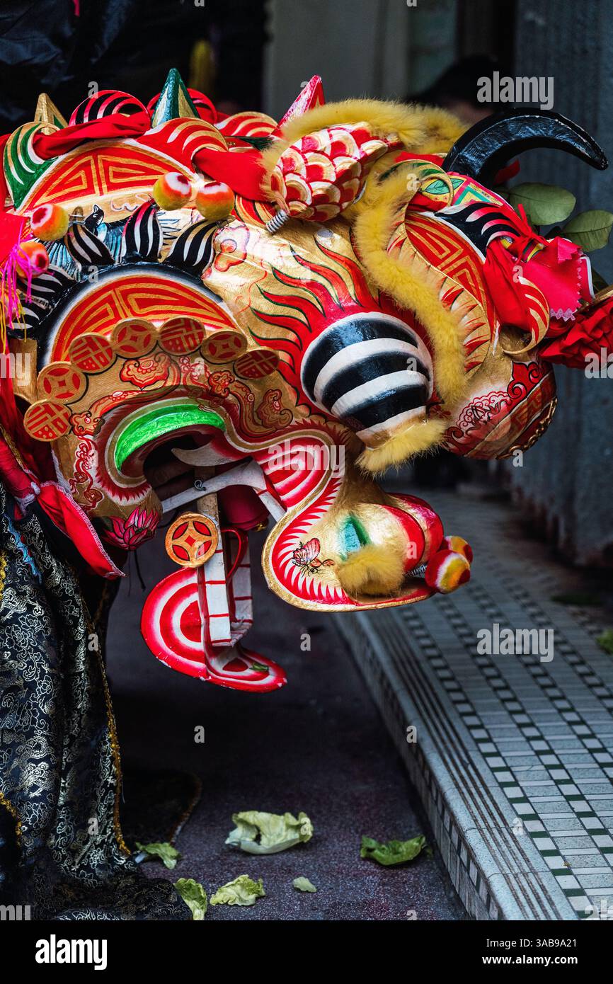 Close-up of a colorful dragon mask worn during the Chinese New Year ...