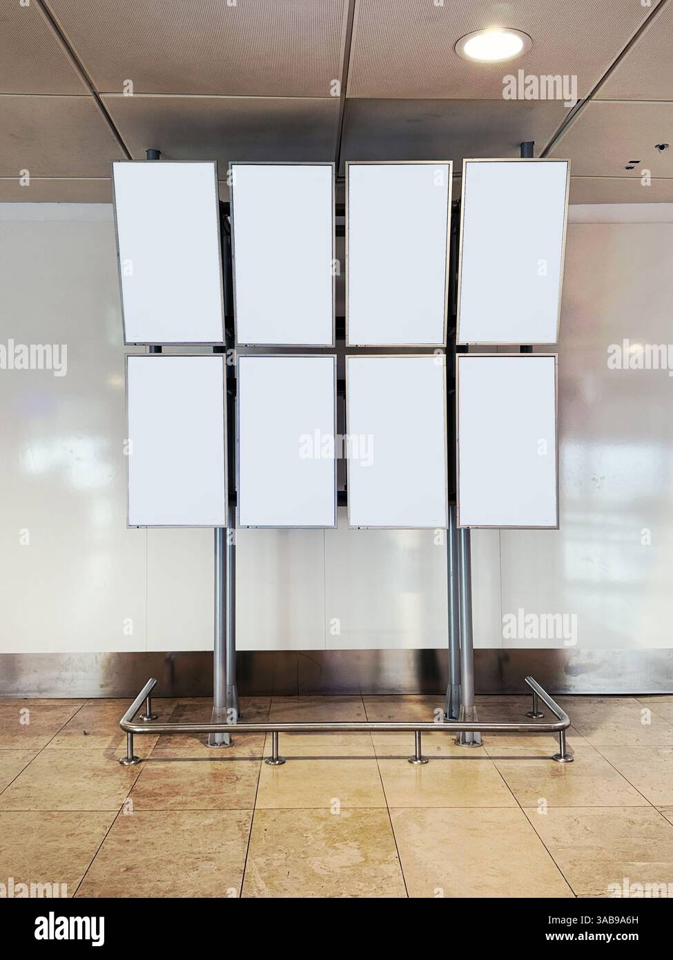 A modern airport information board with blank screens, waiting to ...