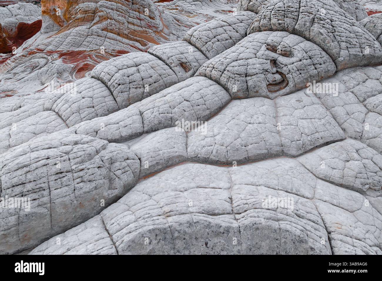 A captivating geological formation showcases abstract white rocks with ...
