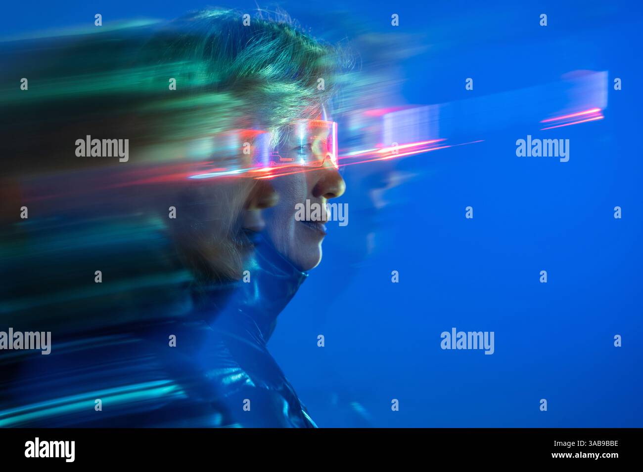 An elderly Asian woman engages with virtual reality in the metaverse ...