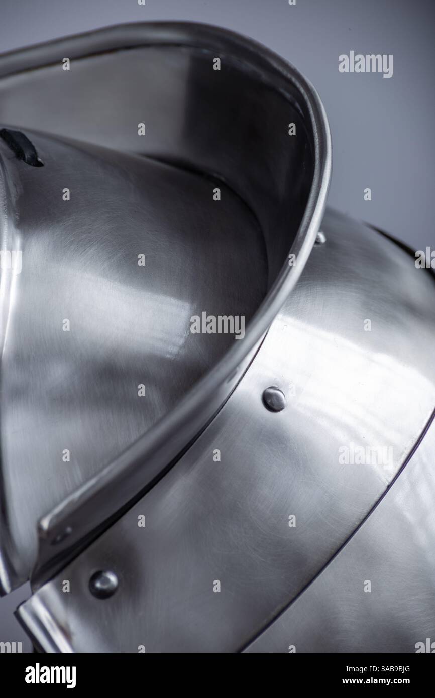 Smooth Polished Steel Shoulder Armor Detail. Close-up view highlighting ...