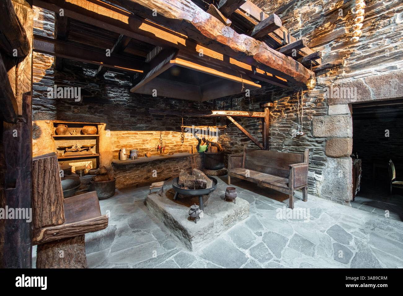 Traditional rustic kitchen inside a country house in Lugo, Spain ...