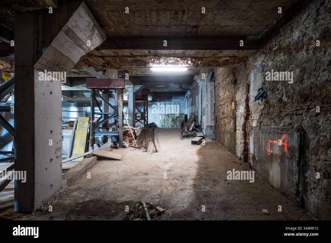 An industrial basement under construction, featuring support structures ...