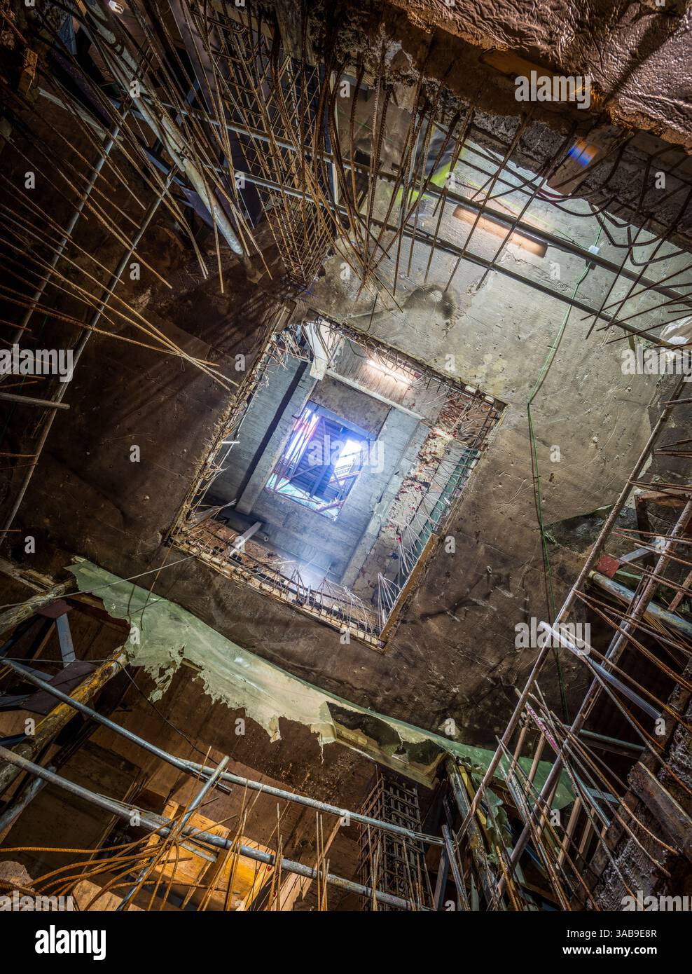 View of a building under construction, showcasing exposed frameworks ...