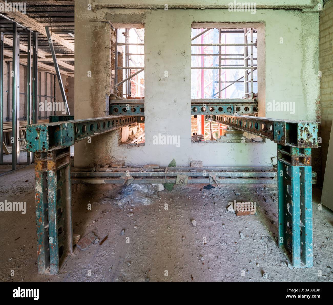 Interior view of a building under renovation. Visible scaffolding and ...
