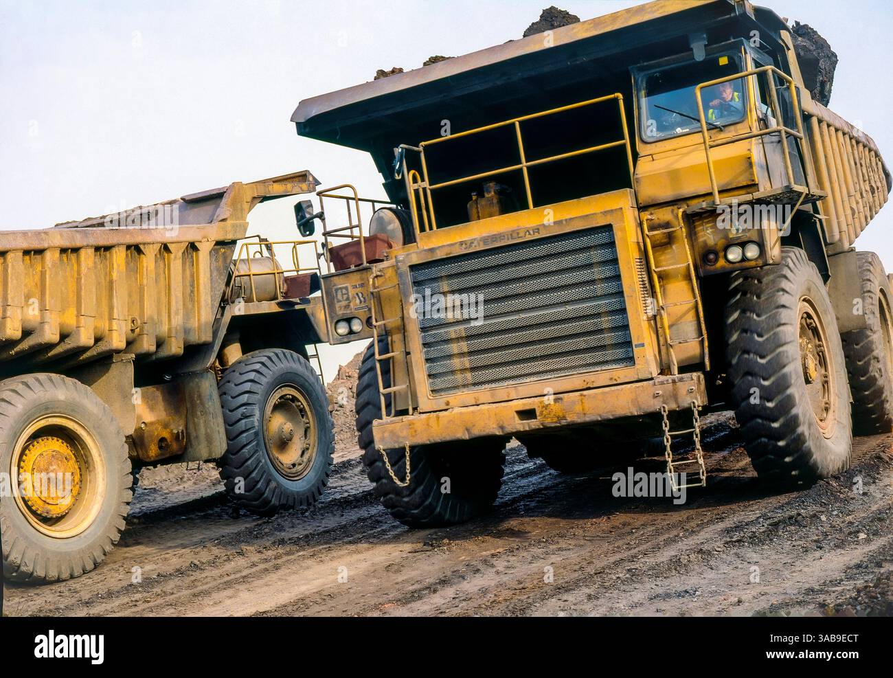 Caterpillar Dump Trucks Stock Photo - Alamy