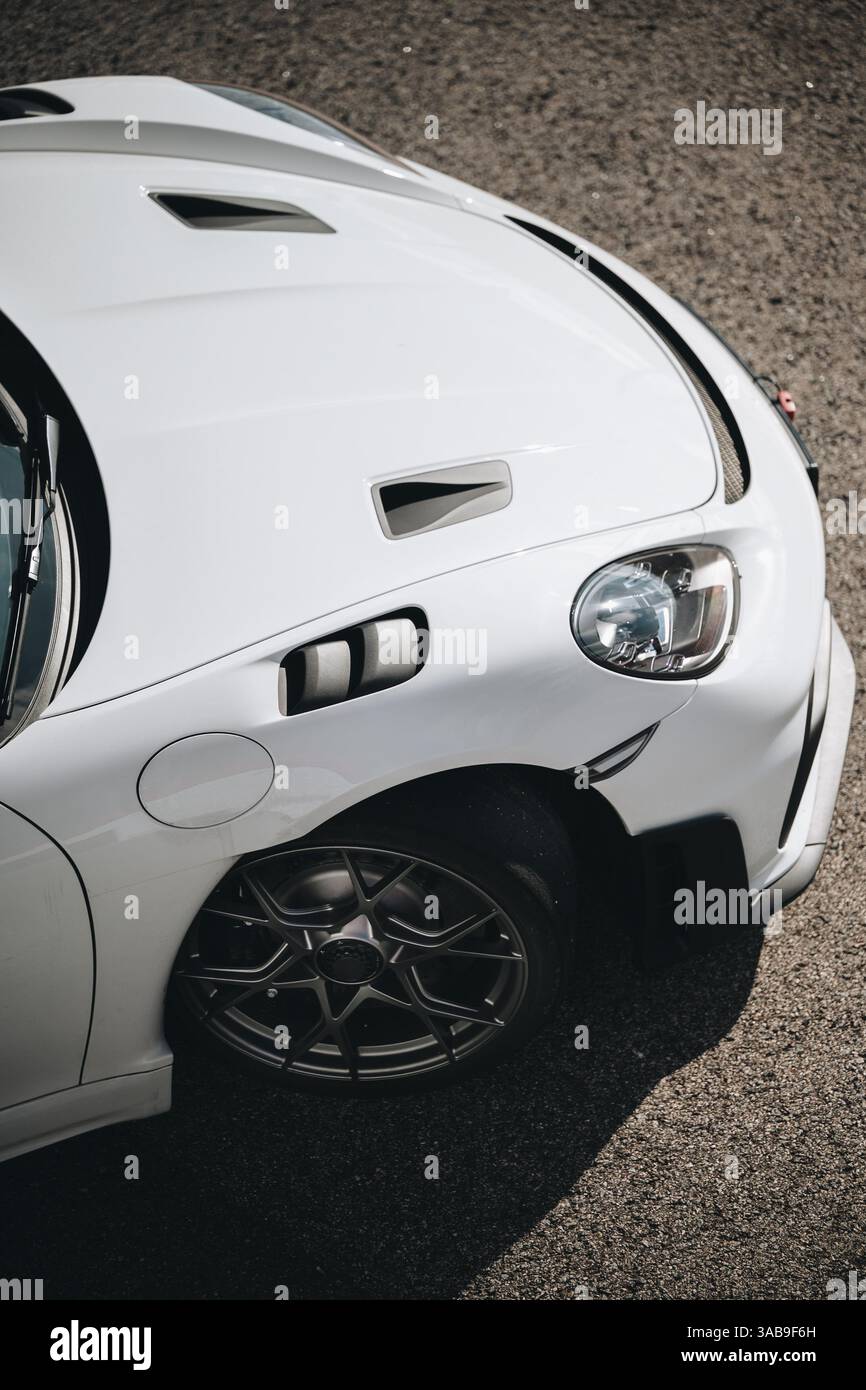 Top view of a white sports car highlighting sleek design, aerodynamic ...