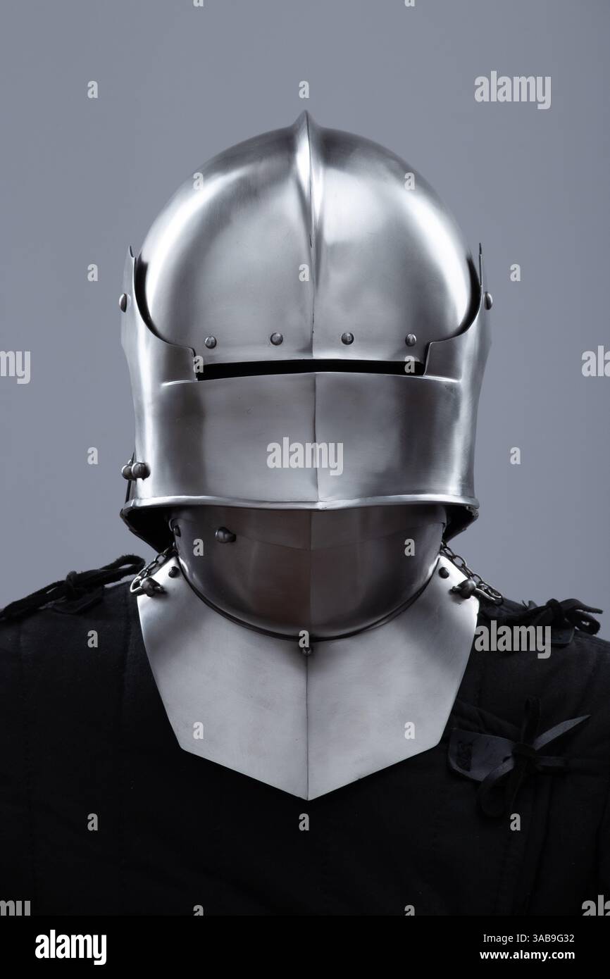 Medieval sallet helmet with visor and bevor. A shiny silver medieval ...