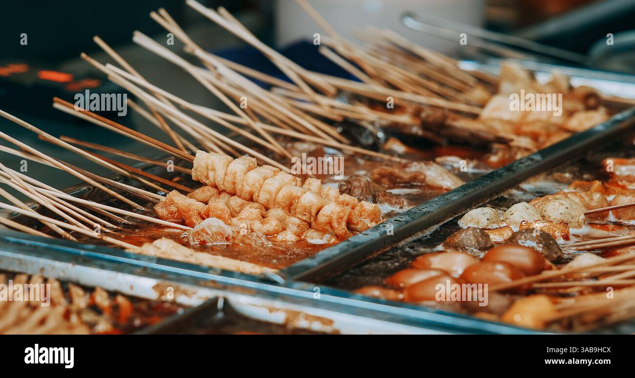 Traditional Chinese Meat Snacks On Bamboo Sticks. Fried Squid, Meat ...