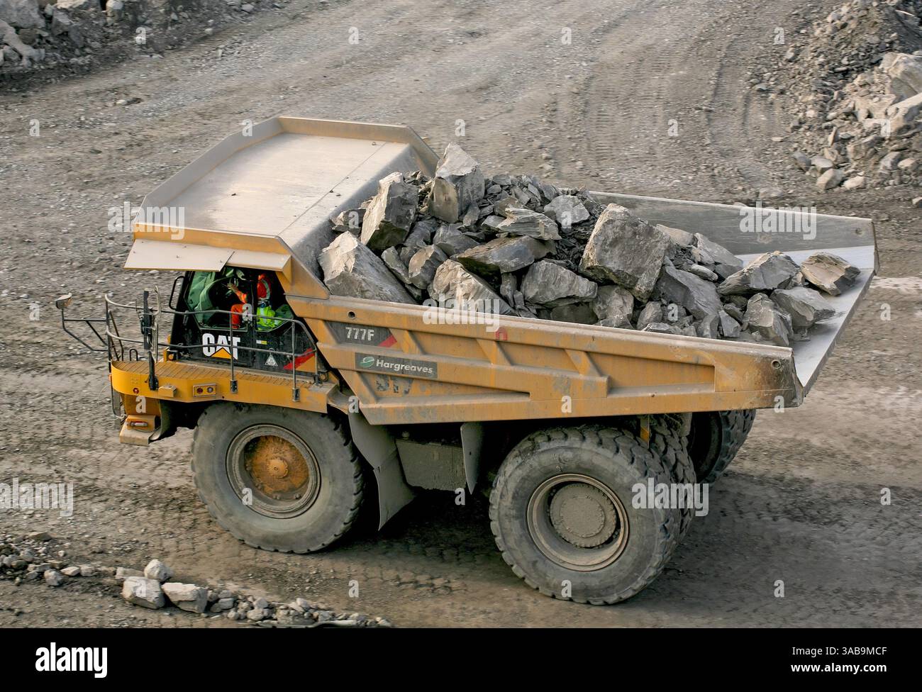 Caterpillar Dump Trucks Stock Photo - Alamy