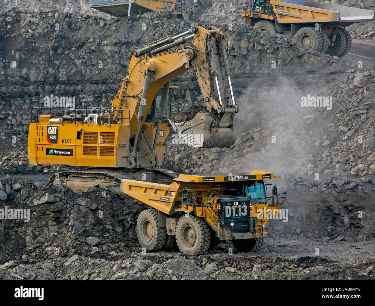 Caterpillar Dump Trucks Stock Photo - Alamy