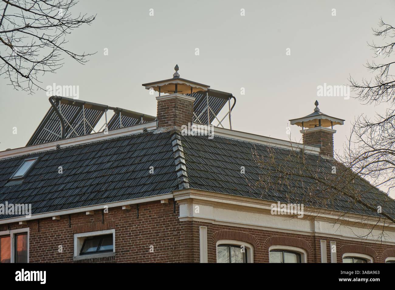 A historic brick building in Wirdum, Friesland, with modern solar heat ...