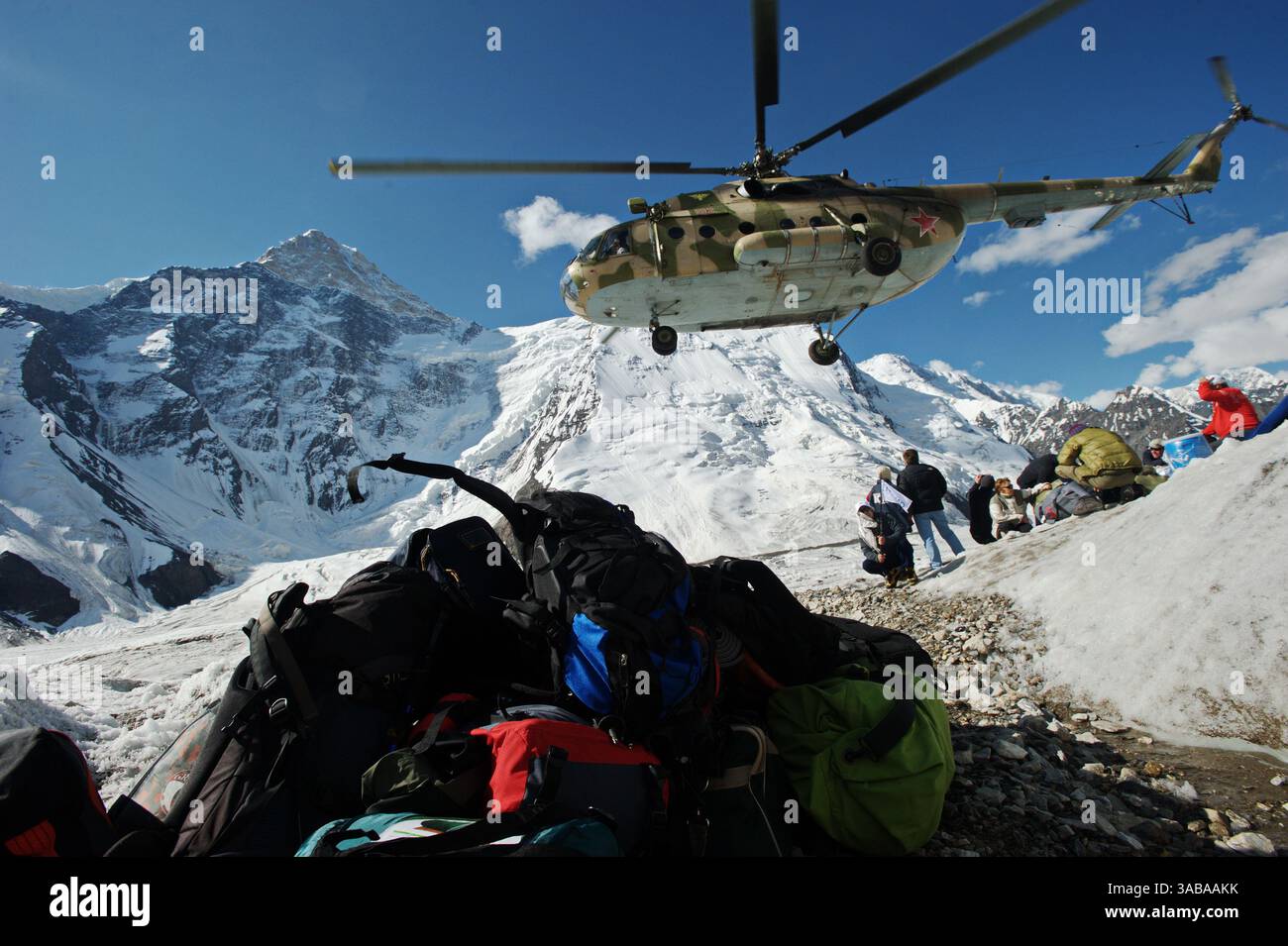 Rescue helicopter at the base camp. The foot of Khan Tengri Peak Stock ...