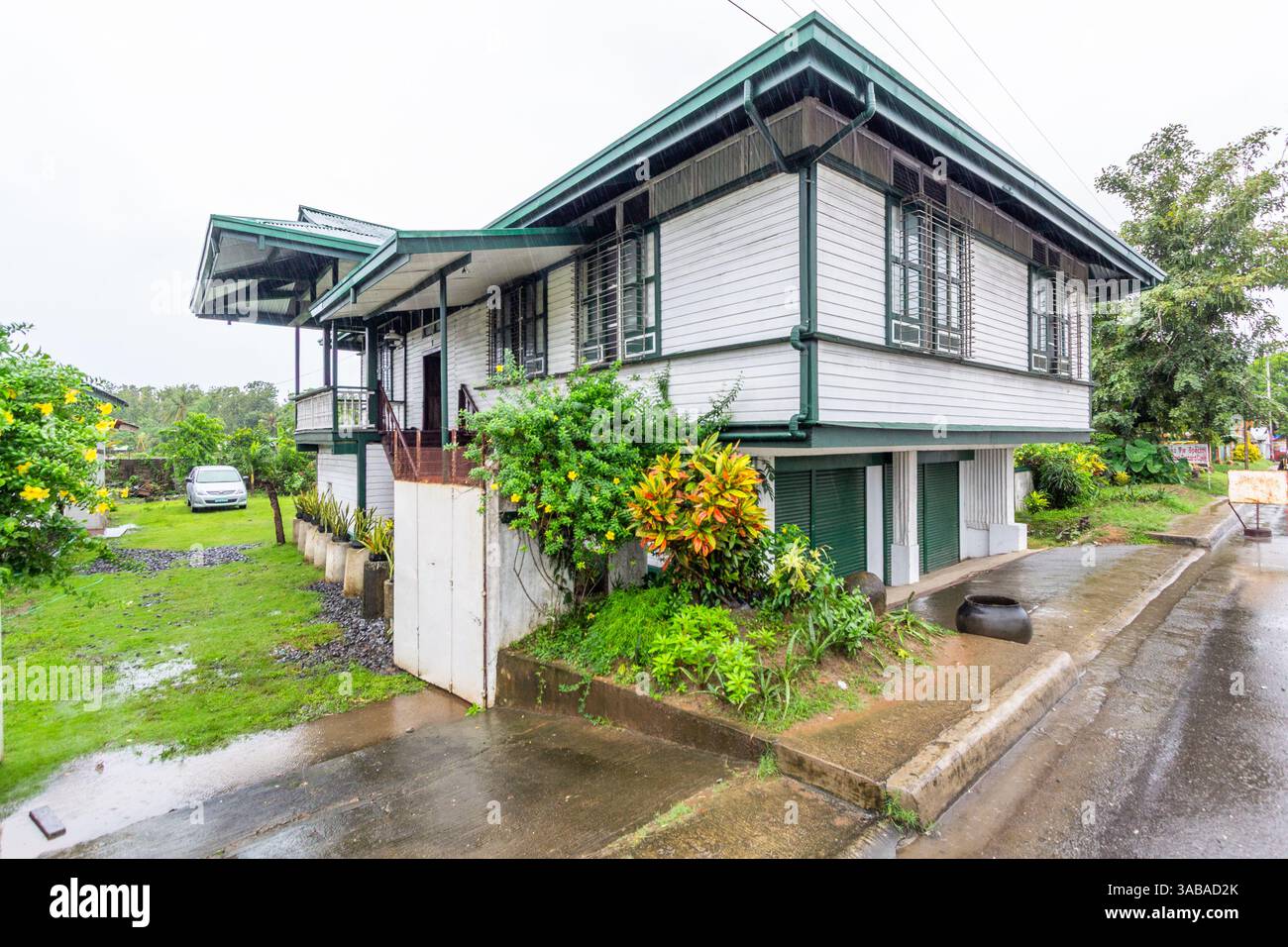 Two-story wooden Filipino ancestral house built in the 1950s located in ...