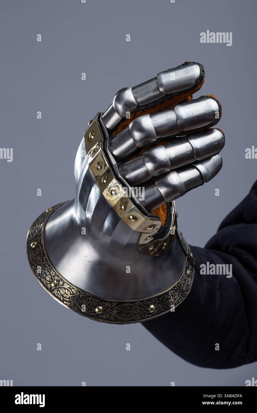 Silver Hourglass Gauntlets with Brass Details. This image shows a close ...