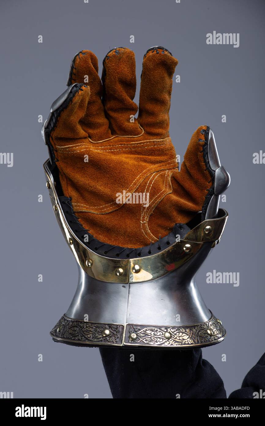 Silver Hourglass Gauntlets with Brass Details. This image shows a close ...