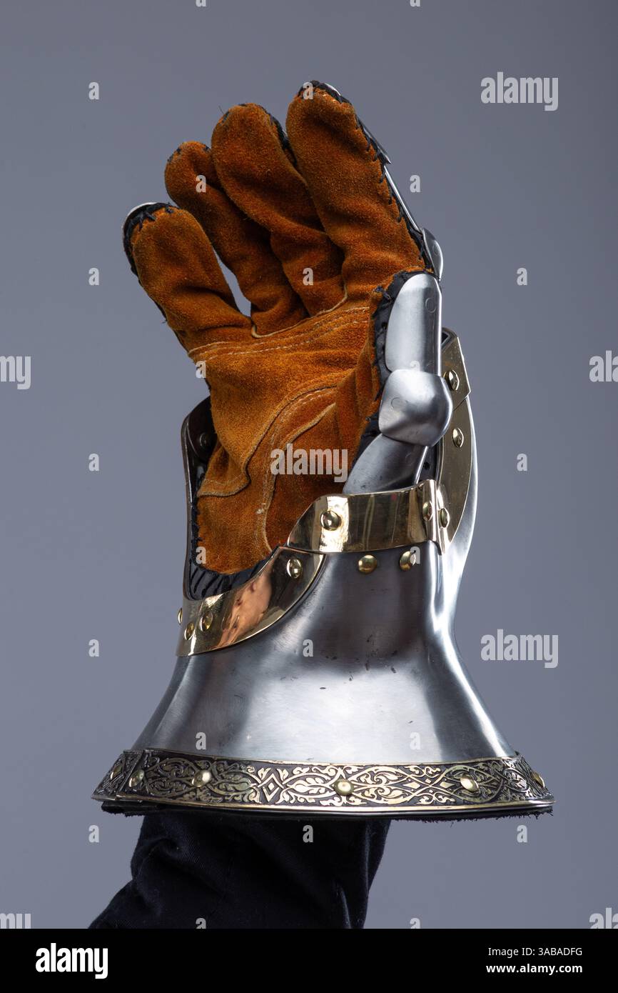 Silver Hourglass Gauntlets with Brass Details. This image shows a close ...